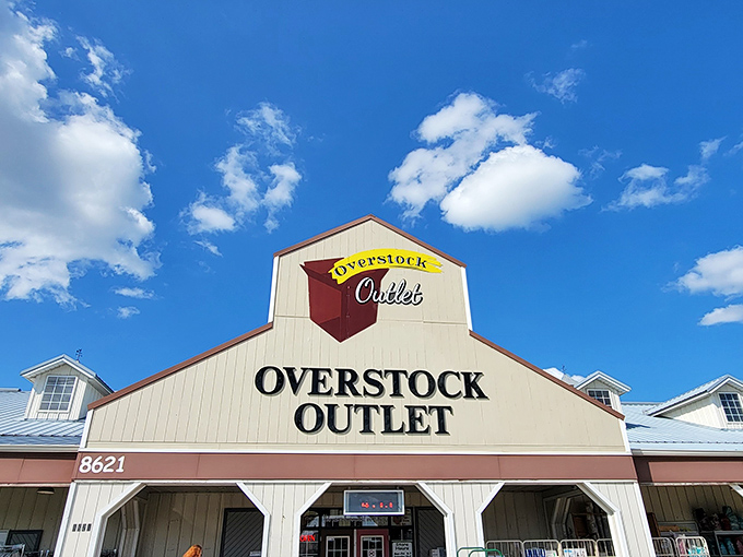 The unassuming barn-style exterior of Overstock Outlet promises treasure within&mdash;like finding a secret gold mine disguised as a humble homestead. 