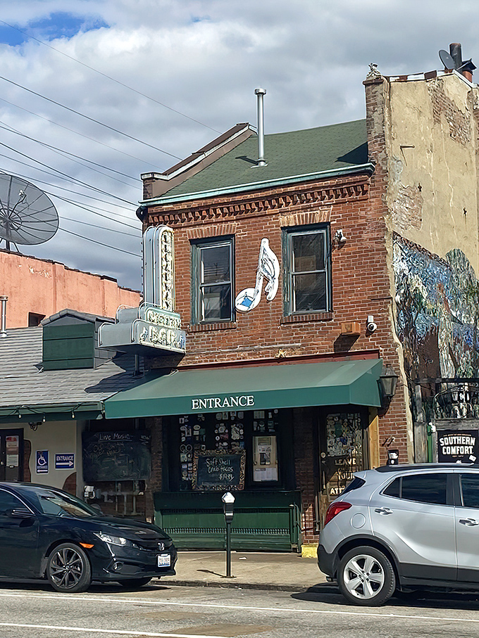 The iconic brick facade and neon sign welcome you like an old friend with a cheeky reminder to check your attitude at the door.