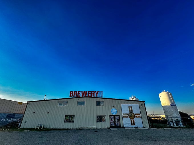 The ultimate "don't judge a book by its cover" moment. This unassuming metal building houses liquid gold under that brilliant New Mexico sky.