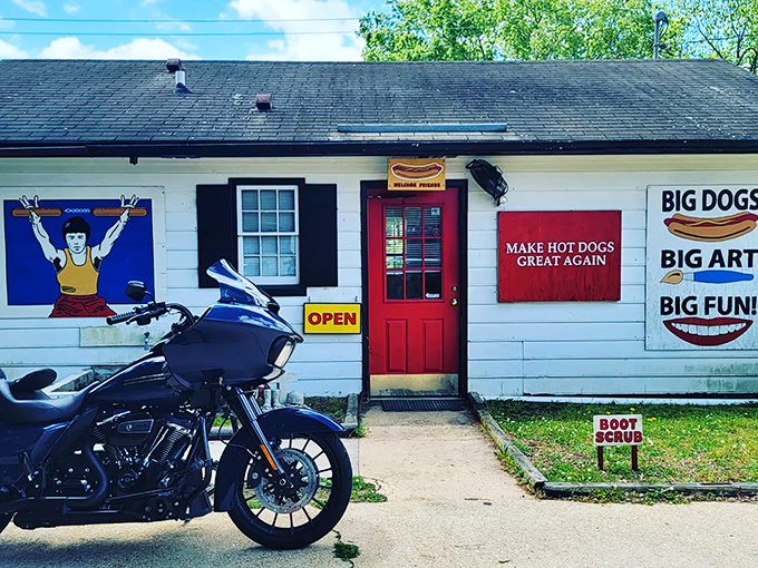 Don't judge a dog by its doghouse! This unassuming white building with its cheerful red door houses hot dog magic that draws devotees from miles around. 