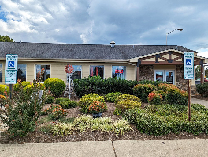 The welcoming fa&ccedil;ade of Moose Cafe in Asheville, where the landscaping is as thoughtfully prepared as the comfort food waiting inside.