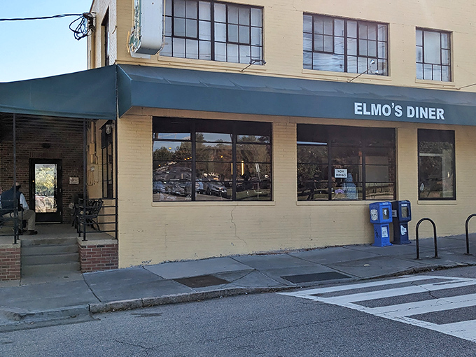 The unassuming exterior of Elmo's Diner in Durham stands like a culinary lighthouse, promising comfort and satisfaction without any unnecessary fuss.