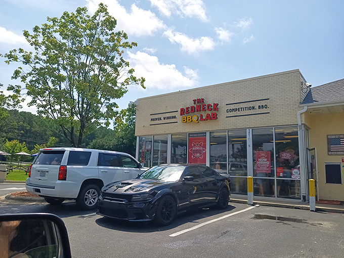 The modest storefront belies the flavor explosion waiting inside &ndash; where "Competition. BBQ." isn't just a tagline, it's a scientific promise.