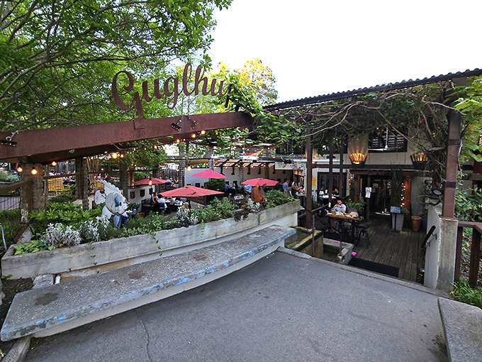 A slice of Bavaria in Durham! This charming outdoor patio is where lederhosen meets Southern hospitality, complete with red umbrellas that pop like cherry tomatoes in a garden salad.