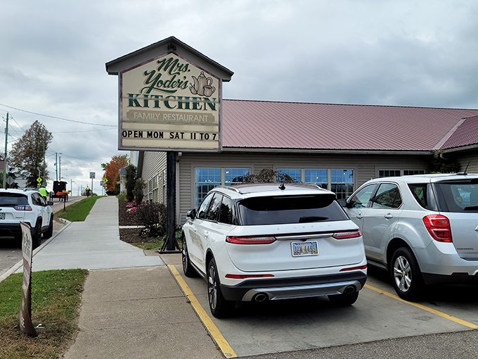 The welcoming sign of Mrs. Yoder's Kitchen stands sentinel in Mt. Hope, promising Amish comfort food that'll make you contemplate moving to Ohio permanently.