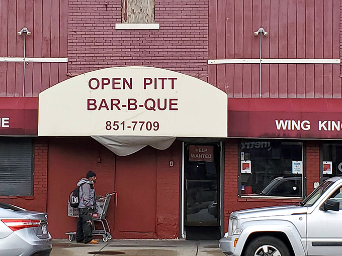 The unassuming burgundy brick exterior of Open Pitt Bar-B-Que stands like a smoke-scented beacon for Cleveland's barbecue faithful. Good food doesn't need fancy packaging.
