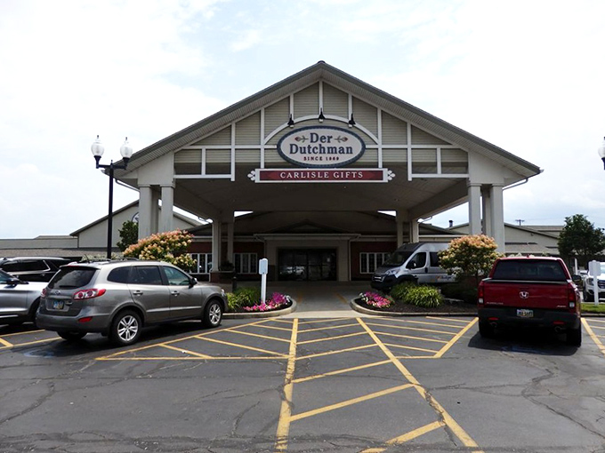 The welcoming facade of Der Dutchman stands like a beacon of comfort food in Plain City, with its charming porch and country-style architecture inviting hungry travelers inside.