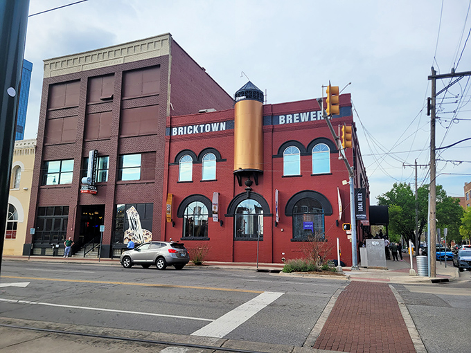 The iconic red brick exterior of Bricktown Brewery stands as a beacon of culinary promise in Oklahoma City's historic district, where industrial charm meets modern appetite.