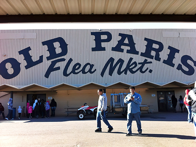 The iconic blue sign beckons treasure hunters like a siren call. Oklahoma City's Old Paris Flea Market promises adventures that no online shopping cart can deliver.