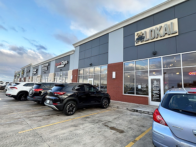 The unassuming brick exterior of The Lokal belies the culinary treasures within. Those two cypress trees stand like sentinels guarding Oklahoma's best-kept secret.