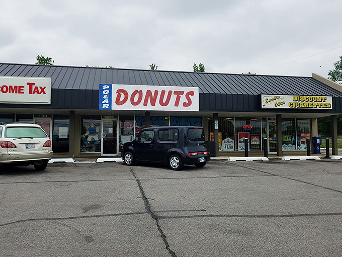 The blue and red signage beckons like a sugar-coated lighthouse. Polar Donuts' storefront promises sweet adventures within those frosty-themed walls.