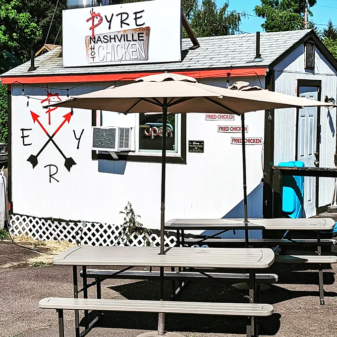 The unassuming exterior of Pyre Nashville Hot Chicken proves once again that culinary treasures often hide in the most modest packages.