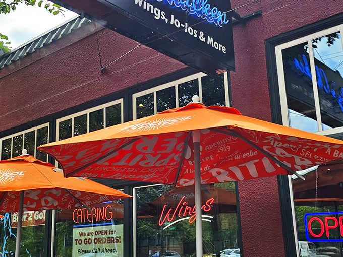 The bright red exterior with vibrant orange umbrellas isn't just eye-catching&mdash;it's nature's way of signaling something delicious awaits inside.
