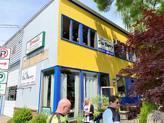 The unassuming exterior of Cafe Du Berry shares space with Tyrrell's, proving once again that culinary treasures often hide in plain sight.