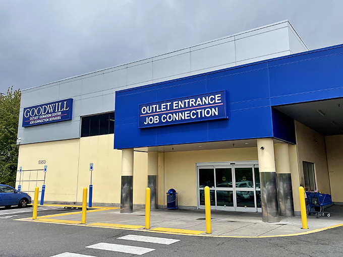 The blue and white facade of Goodwill's Outlet Entrance isn't just a storefront&mdash;it's the gateway to Portland's most ambitious treasure hunts.