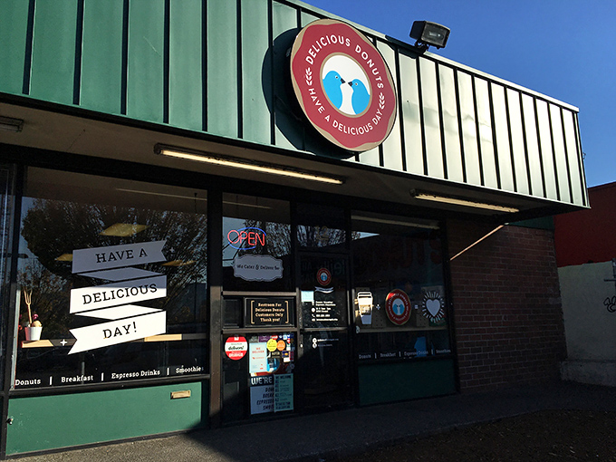 The unassuming green storefront of Delicious Donuts stands like a beacon of hope for carb enthusiasts. Portland's best-kept secret hides in plain sight. 