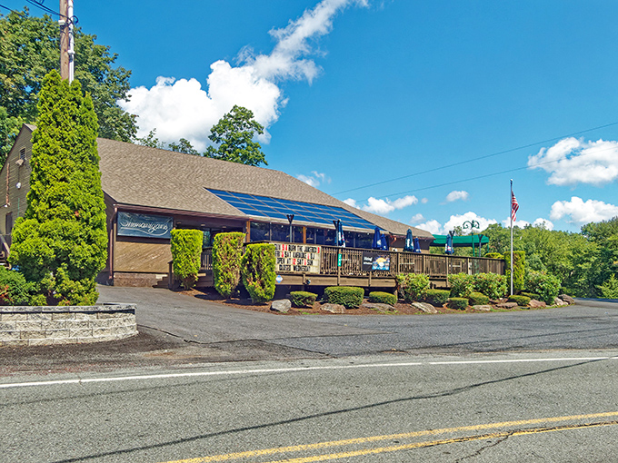 The forest parts to reveal culinary treasure &ndash; Louie's Prime Steak House stands proudly among the trees, its stone foundation and wooden charm beckoning hungry travelers. 