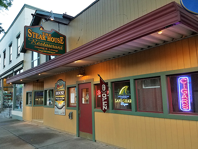 The unassuming yellow exterior hides culinary treasures within, like finding Batman's cave disguised as a suburban home in Wellsboro. 
