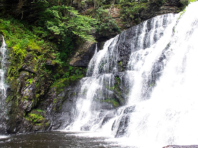The entrance sign to paradise doesn't need neon lights. Raymondskill Falls welcomes visitors with rustic charm and the promise of natural wonder ahead. 