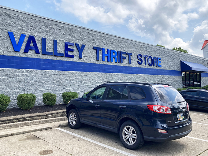 The blue-fronted fortress of frugality awaits! Valley Thrift Store's unassuming exterior hides a universe of secondhand treasures inside.