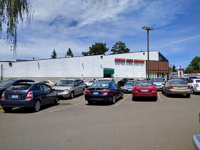 The unassuming exterior of Super King Buffet stands like a temple of abundance, its packed parking lot the first clue you've found Portland's buffet paradise.