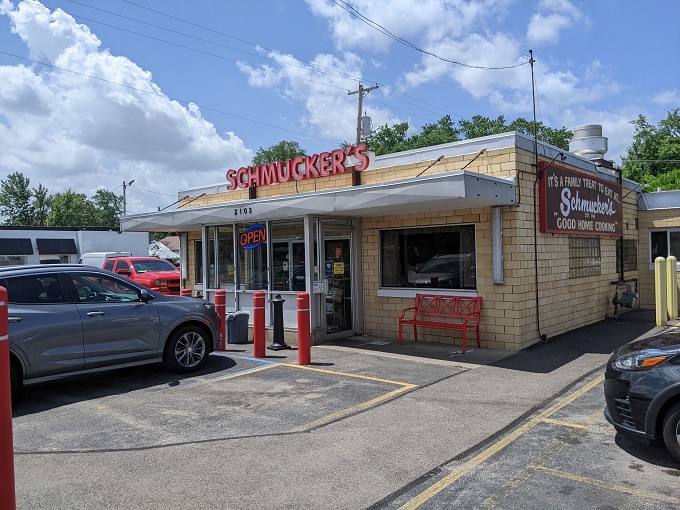 The glowing red sign of Schmucker's beckons like a lighthouse for hungry souls. Time-tested simplicity that promises exactly what it delivers.