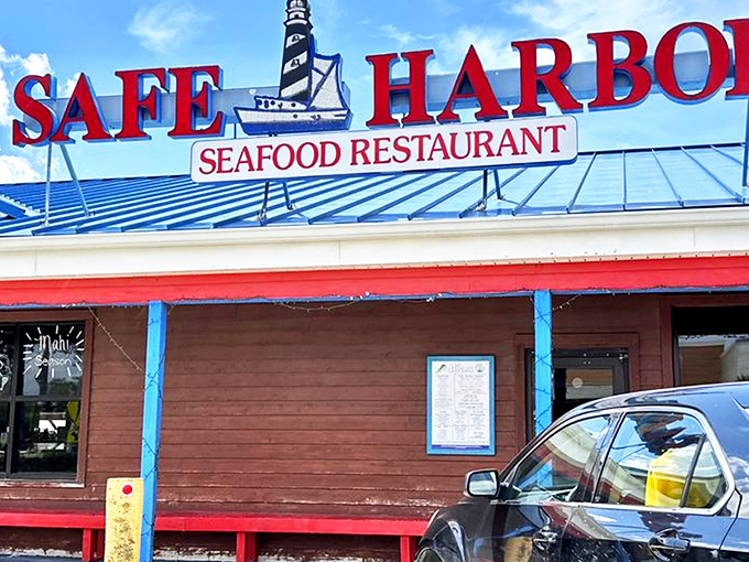 The blue roof and bold red signage beckon like a lighthouse for hungry souls. Simplicity on the outside, seafood magic within.