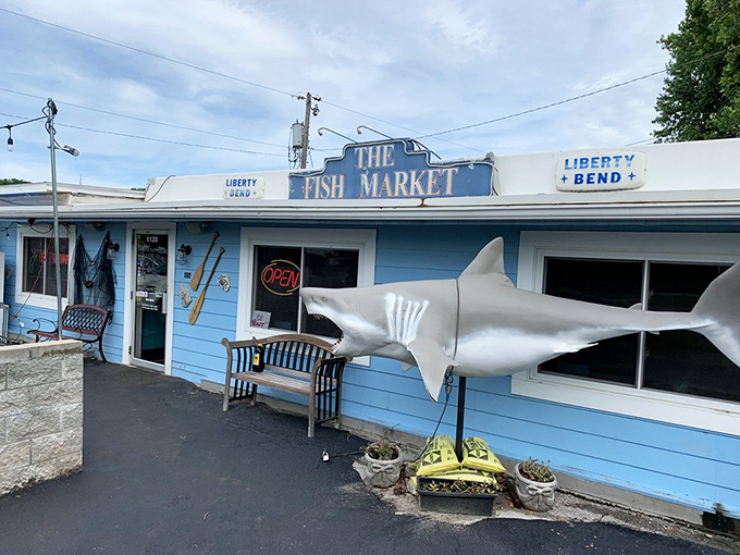 The unassuming blue exterior of The Fish Market in Liberty might fool you, but those string lights are basically saying "seafood paradise ahead!"