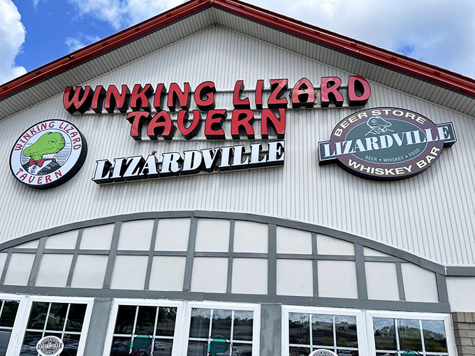 The Winking Lizard's welcoming glow beckons hungry travelers like a lighthouse for the gastronomically adrift. Come for the crab cakes, stay for everything else.