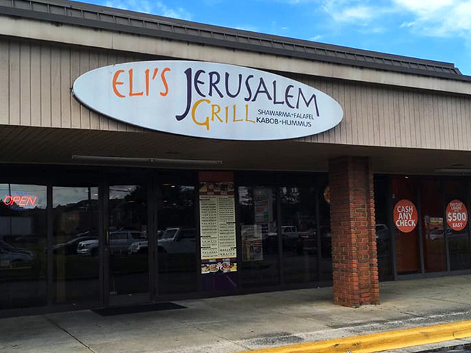 The unassuming storefront of Eli's Jerusalem Grill belies the culinary treasures waiting inside. Sometimes the best global cuisine hides in plain sight.