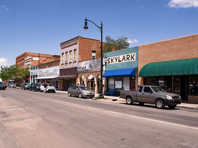 
The famous corner in Winslow, Arizona, complete with Route 66 shield painted right on the pavement. Rock and roll geography at its finest!