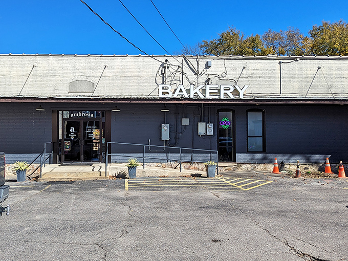 The unassuming exterior of Ambrosia Bakery proves that culinary greatness often hides behind modest facades, like finding Narnia in an ordinary wardrobe.