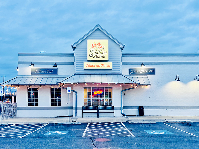 The Seafood Shack's inviting exterior promises maritime delights in landlocked Arkansas. String lights and outdoor seating beckon hungry travelers like a lighthouse for seafood lovers.