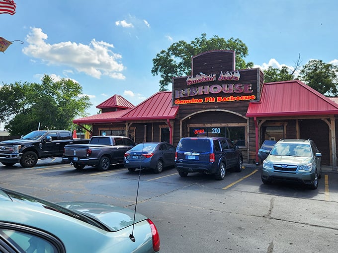 The rustic wooden facade of Smokin' Joe's Ribhouse isn't trying to impress anyone&mdash;until you taste what's cooking inside. That red roof? Consider it a beacon for barbecue pilgrims.