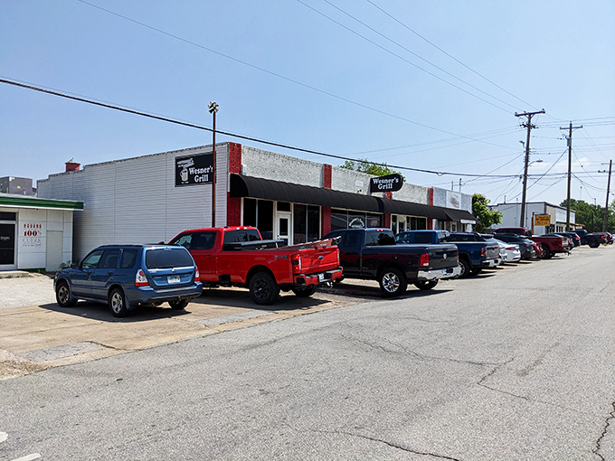 The red and white exterior of Wesner's Grill stands like a beacon of breakfast hope on Chestnut Street. No fancy frills, just honest food awaiting inside.