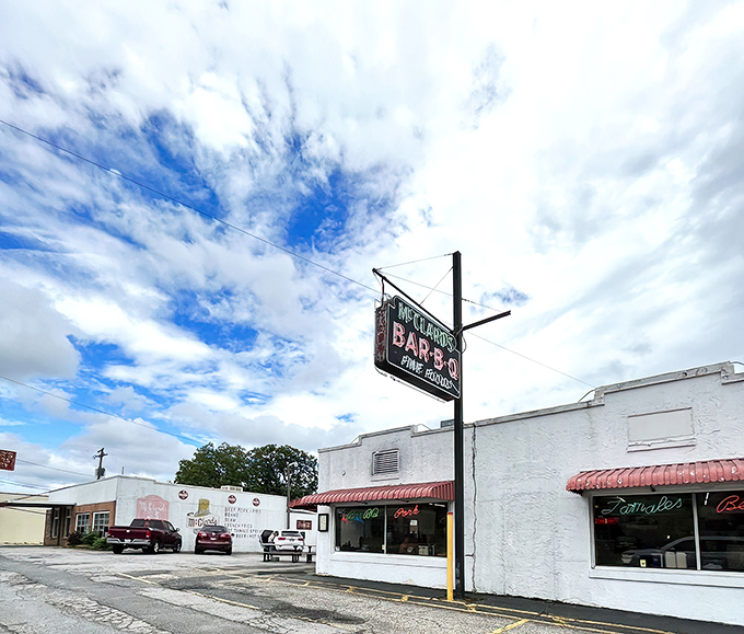 The humble white exterior of McClard's hides a smoky paradise within&mdash;proof that BBQ greatness doesn't need fancy architecture, just decades of dedication.