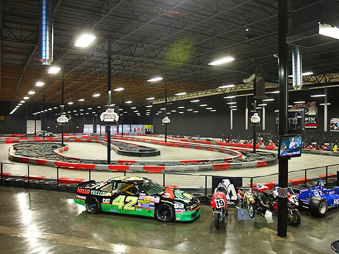 The sprawling indoor track at MB2 Raceway looks like NASCAR's cooler, more accessible cousin where average Joes become racing legends for an afternoon.