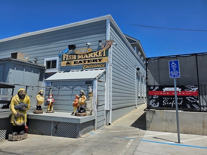 The unassuming blue exterior of Phil's Fish Market & Eatery stands like a salty sea captain &ndash; weathered, unpretentious, and hiding treasures within.