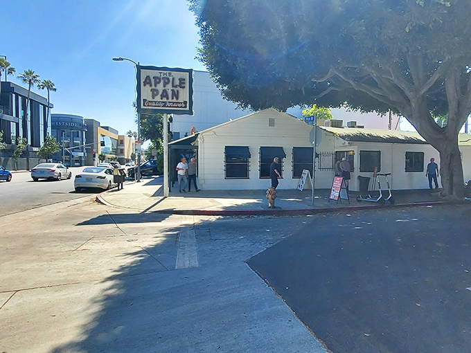 The unassuming exterior of The Apple Pan stands like a time capsule amid modern LA, its vintage sign promising "Quality Forever" &ndash; a bold claim they've somehow managed to keep.