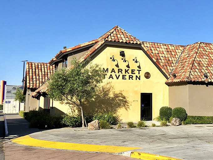 The Spanish-style terracotta roof and inviting facade of Market Tavern stands like a Mediterranean oasis in Dublin, California's suburban landscape.