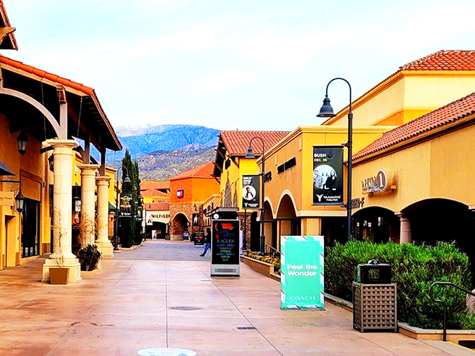 Desert chic meets shopping paradise at Desert Hills Premium Outlets, where terra cotta buildings and palm trees frame your bargain-hunting adventure.