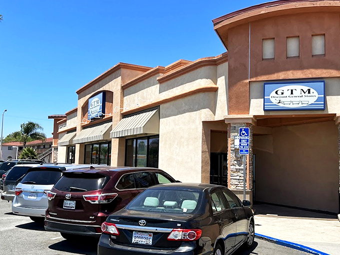 The unassuming exterior of GTM Stores in Santee hides a treasure trove of bargains within, like a discount speakeasy that everyone's invited to.