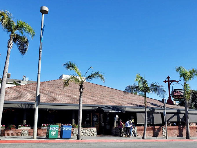 The Kettle's flower-adorned exterior isn't just pretty&mdash;it's a promise. Those vibrant blooms welcome you like a colorful handshake before the main event begins.