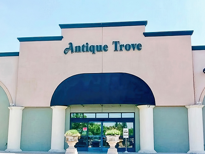 The stately fa&ccedil;ade of Antique Trove beckons with its elegant green awnings, promising treasures within that IKEA could never dream of offering.