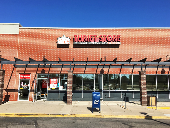 The unassuming brick exterior of arc Thrift Store hides a treasure trove within, like finding a speakeasy but for vintage bargains instead of cocktails.