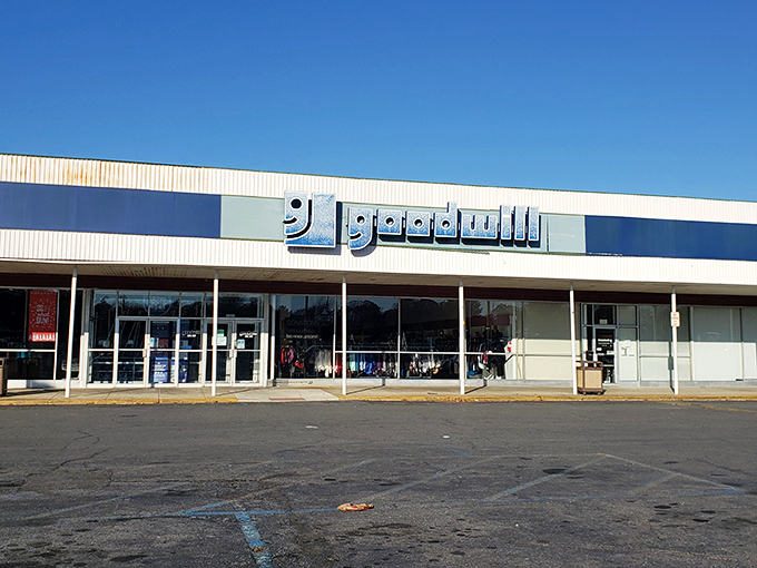 The blue-and-white facade of Dover's Goodwill beckons like a siren song to treasure hunters. What wonders await behind those sliding doors?