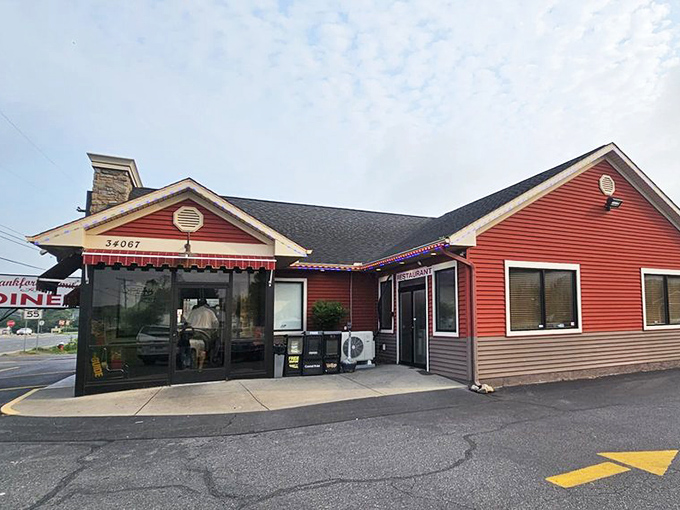 The cherry-red exterior of Frankford Family Diner stands out like a beacon of comfort food hope on Route 113, promising delicious salvation for hungry travelers.