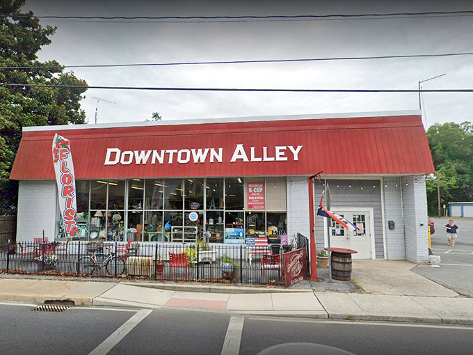 The unassuming exterior of Downtown Alley belies the wonderland within. That American flag isn't just decoration—it's a warning that you're about to experience peak Americana.
