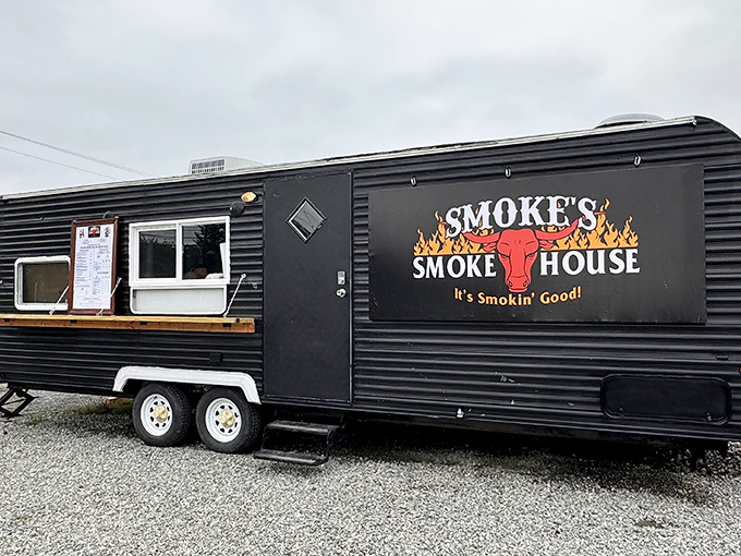 The black trailer with flames on the logo isn't just a food truck&mdash;it's a smoke-signaling beacon for BBQ pilgrims across Delaware.