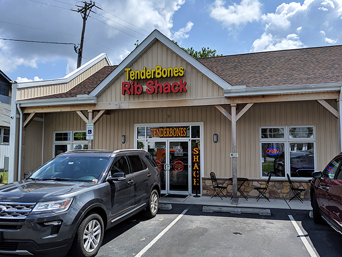 The barbecue promised land awaits behind that unassuming tan exterior. TenderBones Rib Shack's bright sign is like a beacon for smoke-seeking pilgrims.